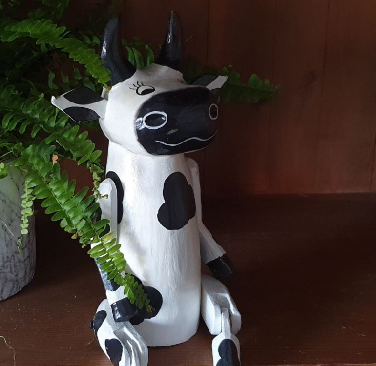 hand carved shelf puppet cow