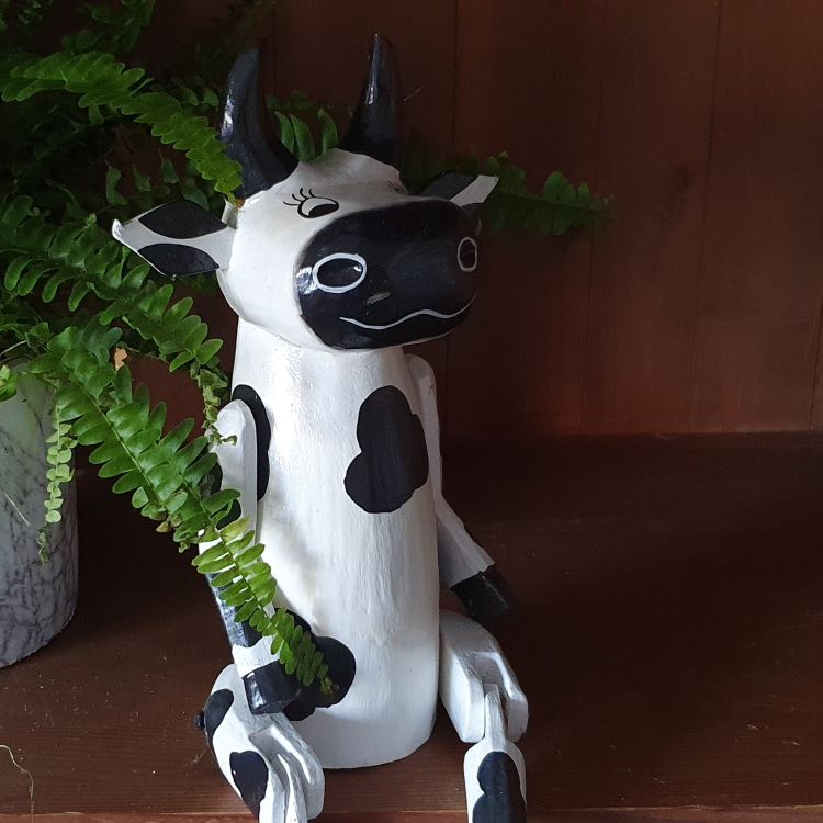 hand carved shelf puppet cow