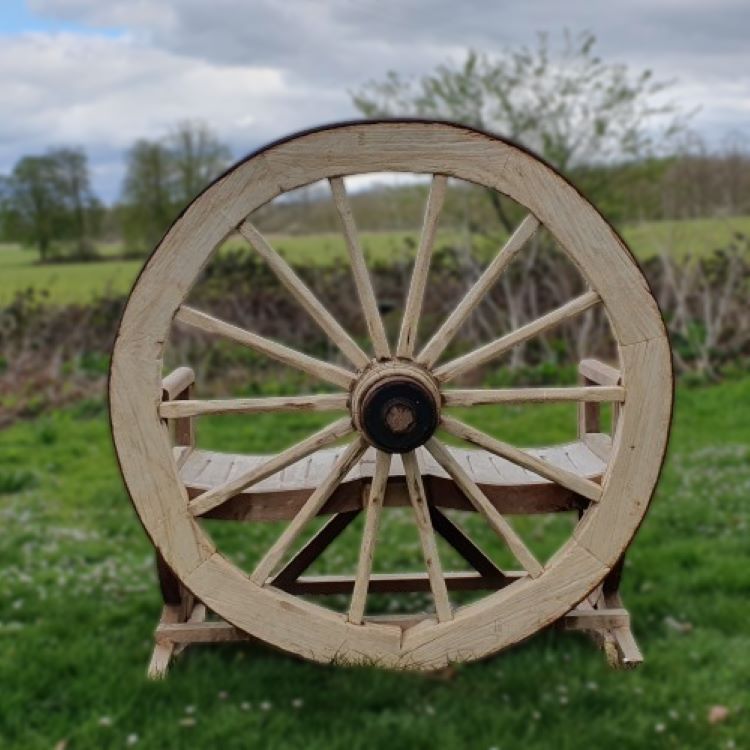Handcrafted teak wagon wheel rustic bench