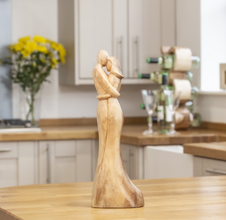 Carved Wooden Embracing Couple