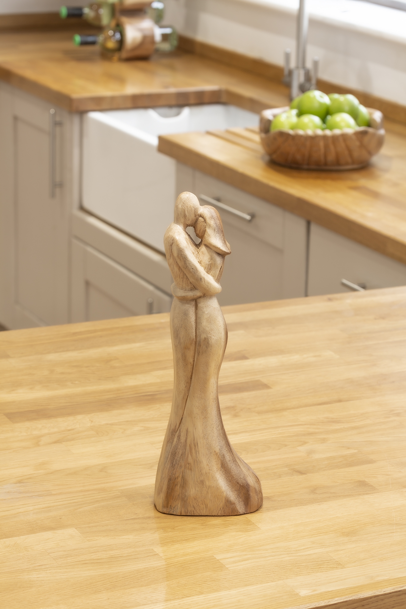 Carved Wooden Embracing Couple